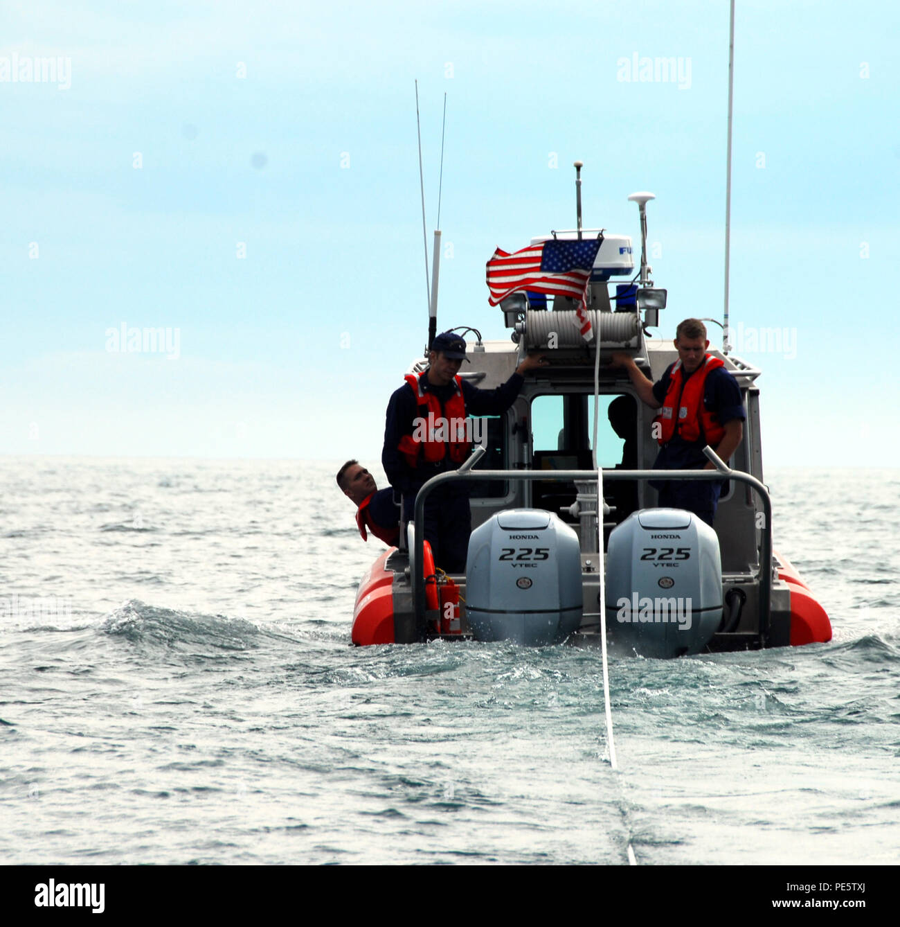 Members of Coast Guard Station Harbor Beach, Mich., stand tow watch ...