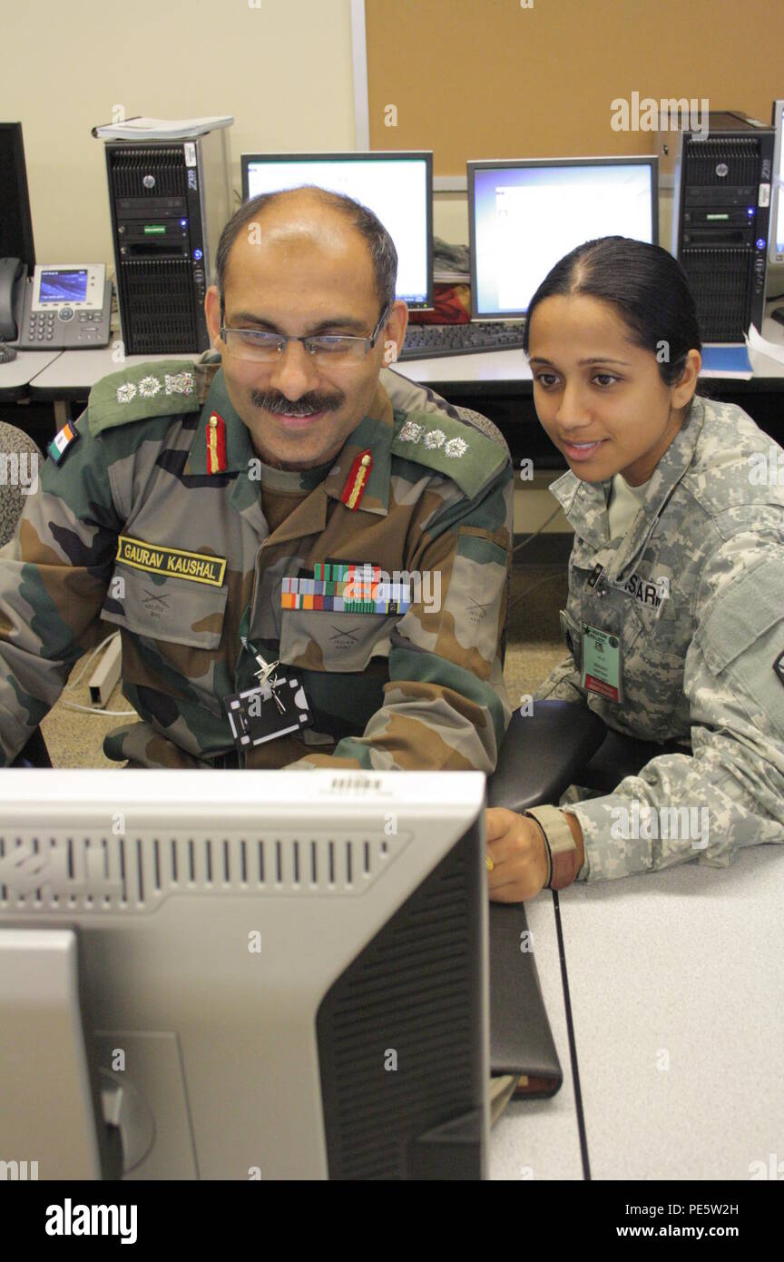California National Guard Soldier Staff Sgt. Balreet Khaira, right ...