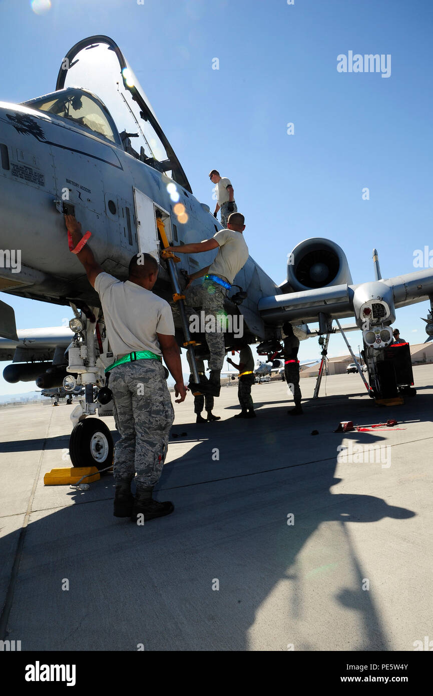 U.S. Airmen from the 355th Aircraft Maintenance Squadron recover an A ...