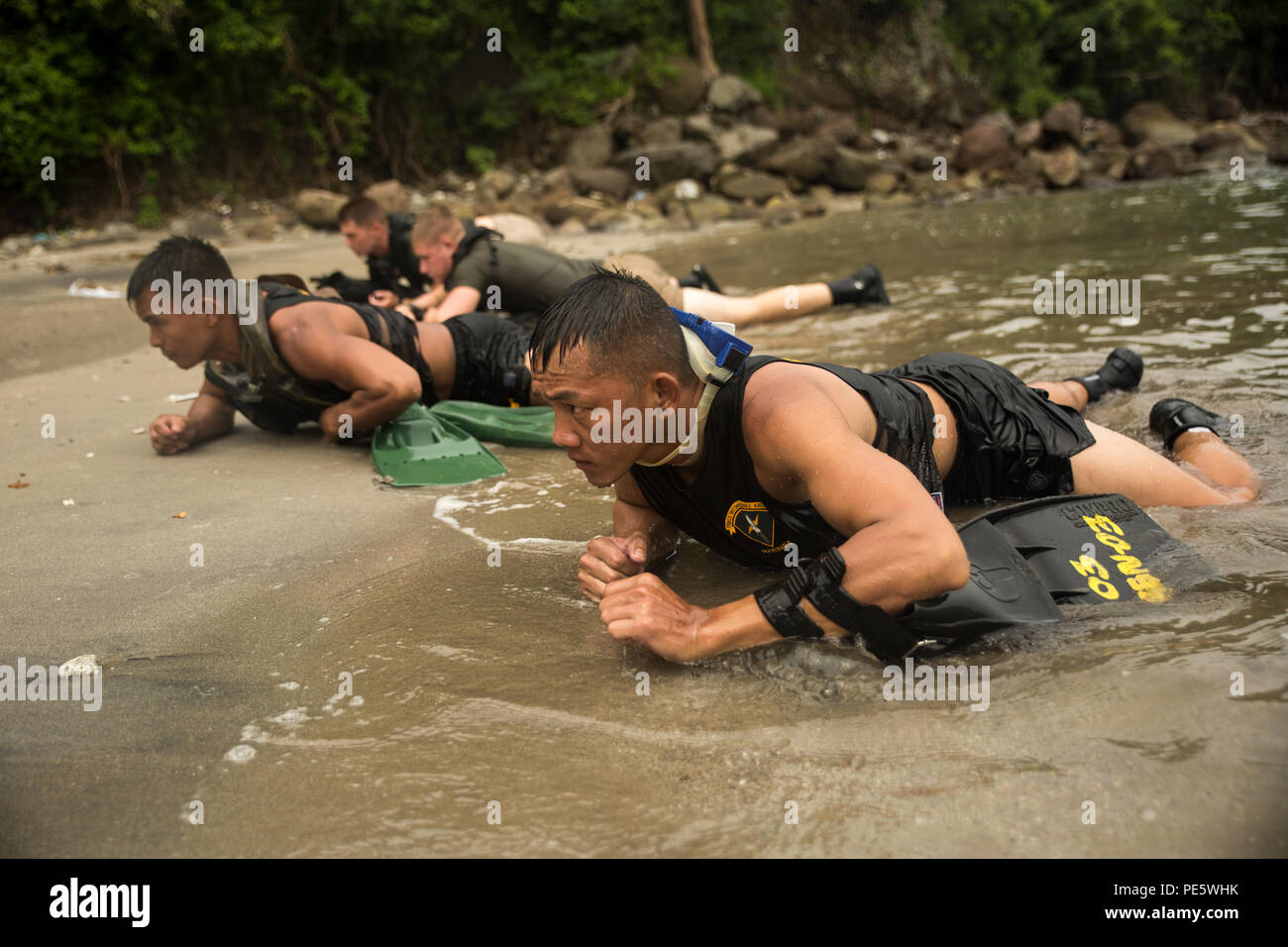 Philippine Marine Corps Cpl. Randy Bolanio executes a clandestine ...