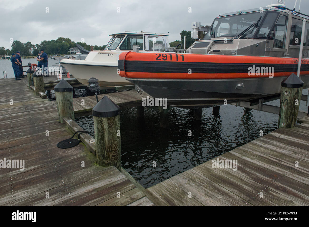 A 29-foot Response Boat Small sits on a boatlift at Coast Guard Station ...
