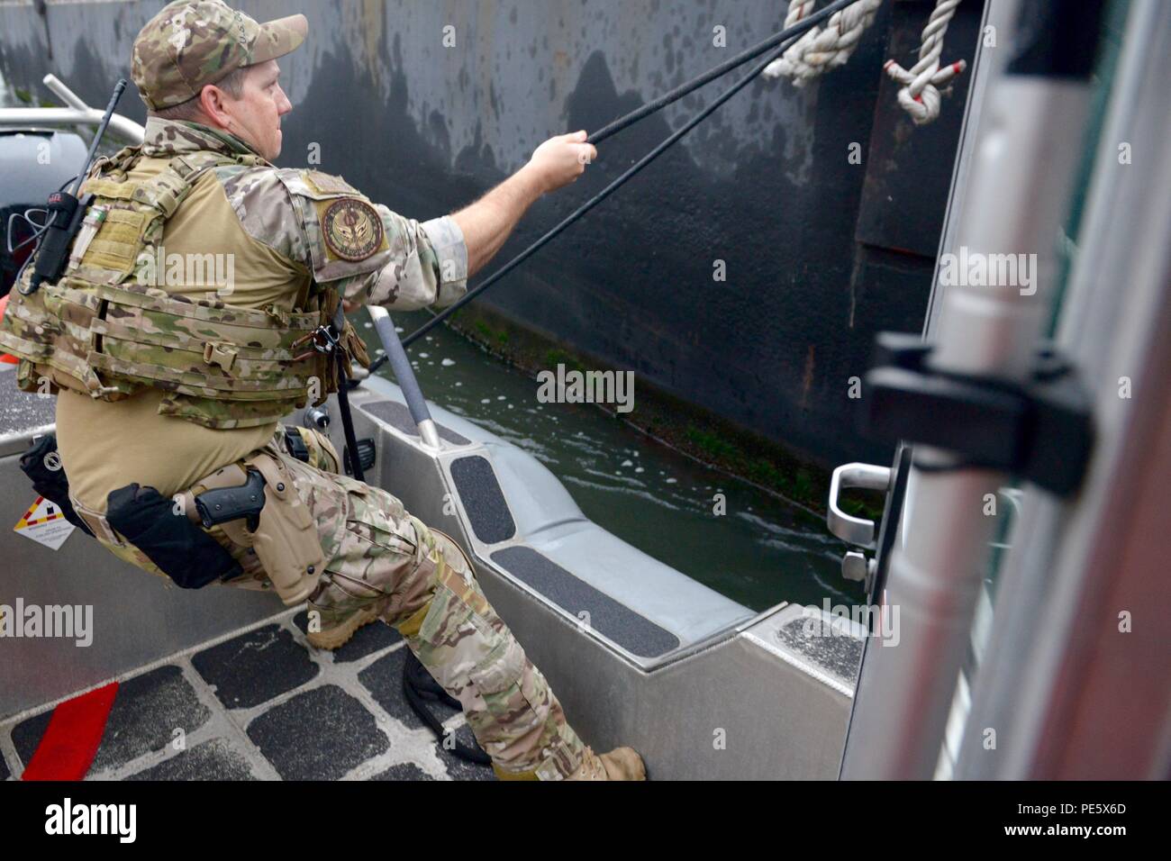 A Coast Guard Maritime Security Response Team machinery technician ...