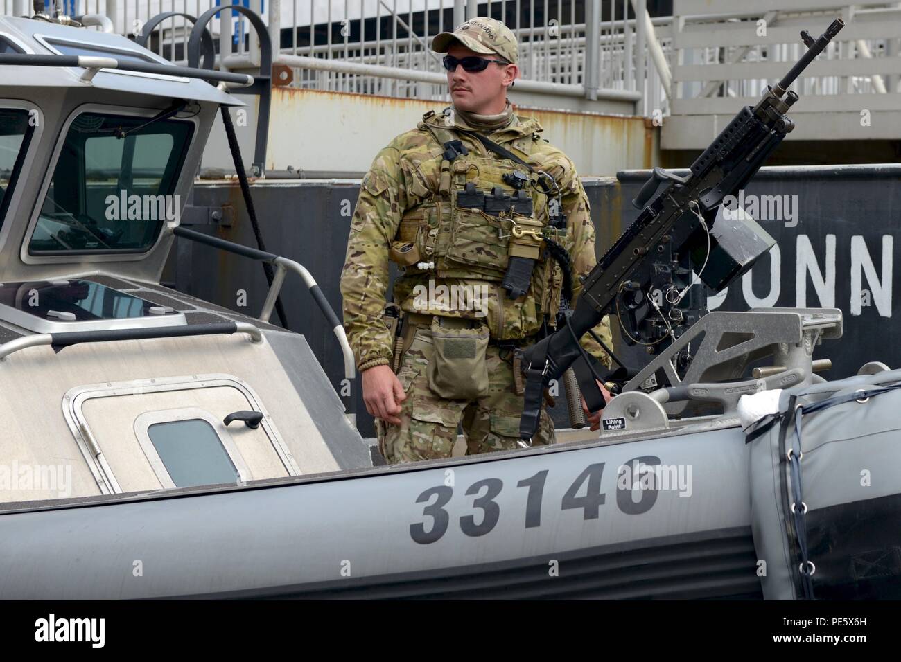 Petty Officer 3rd Class Steven Susen, a maritime enforcement specialist ...