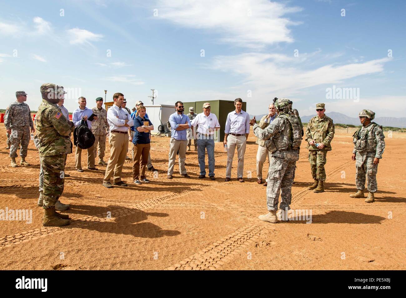 Distinguished visitors visit the expeditionary base camp run by the 1st ...