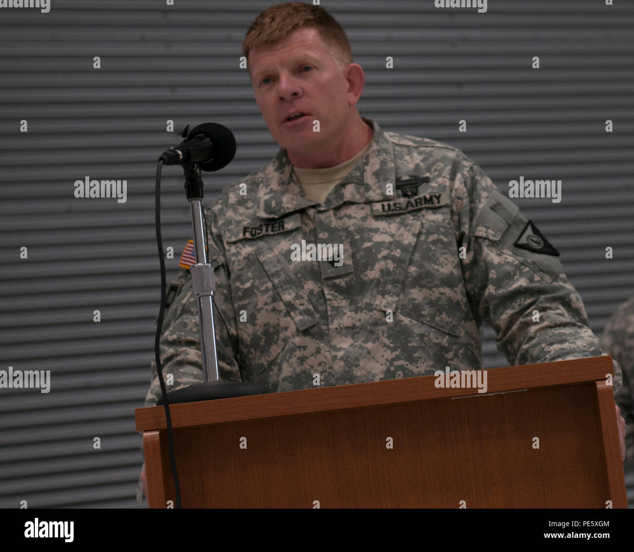 Lt. Col. David Foster, 86th Troop Command outgoing commander, delivers ...
