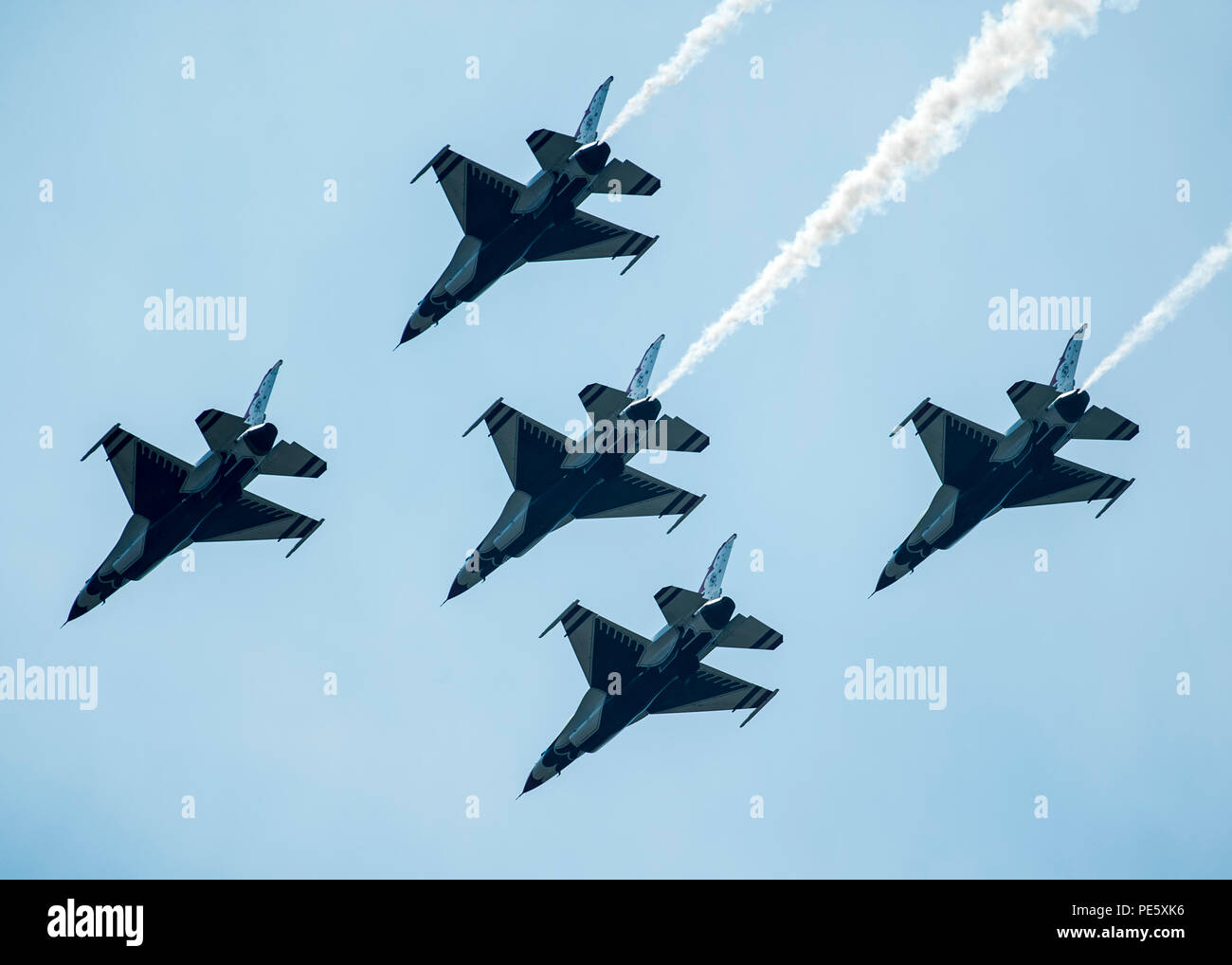 Thunderbirds pilots perform the five card loop maneuver during the ...