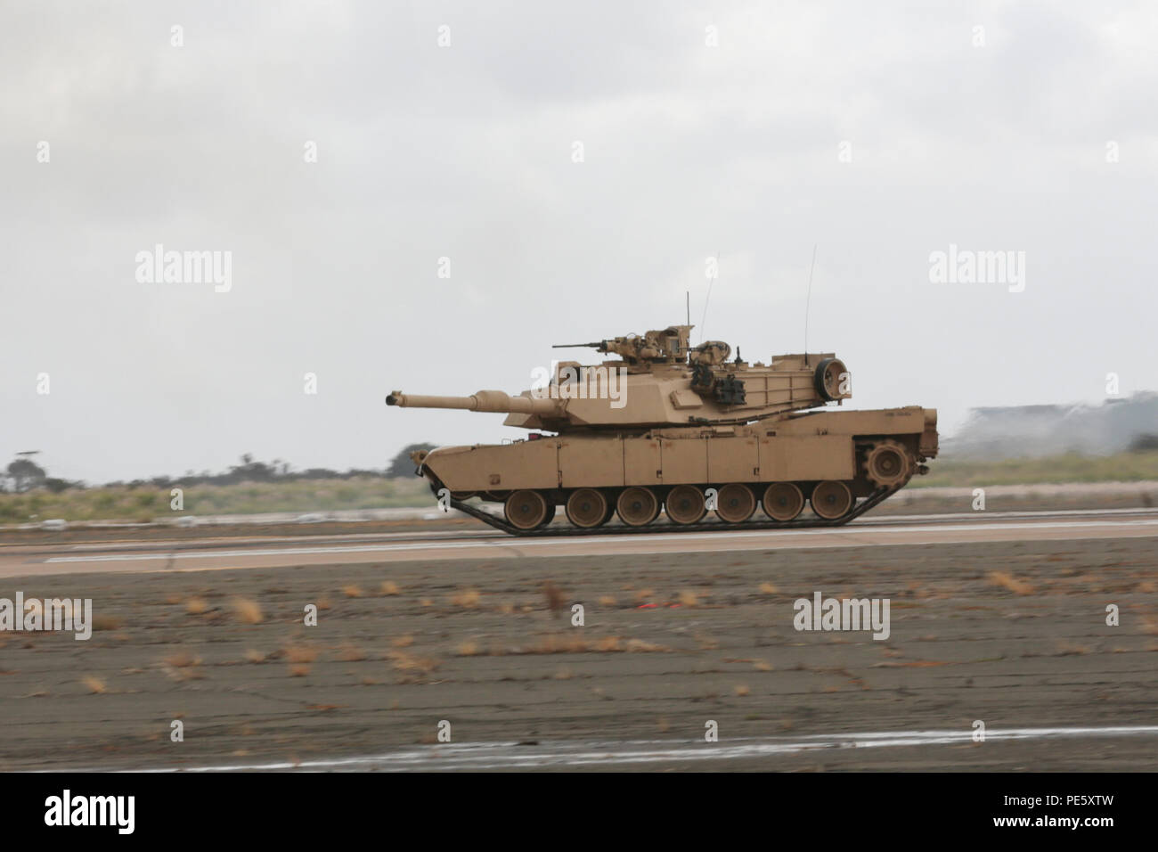 A U.S. Marine Corps M1-A1 Abrams tank moved across the flight line ...