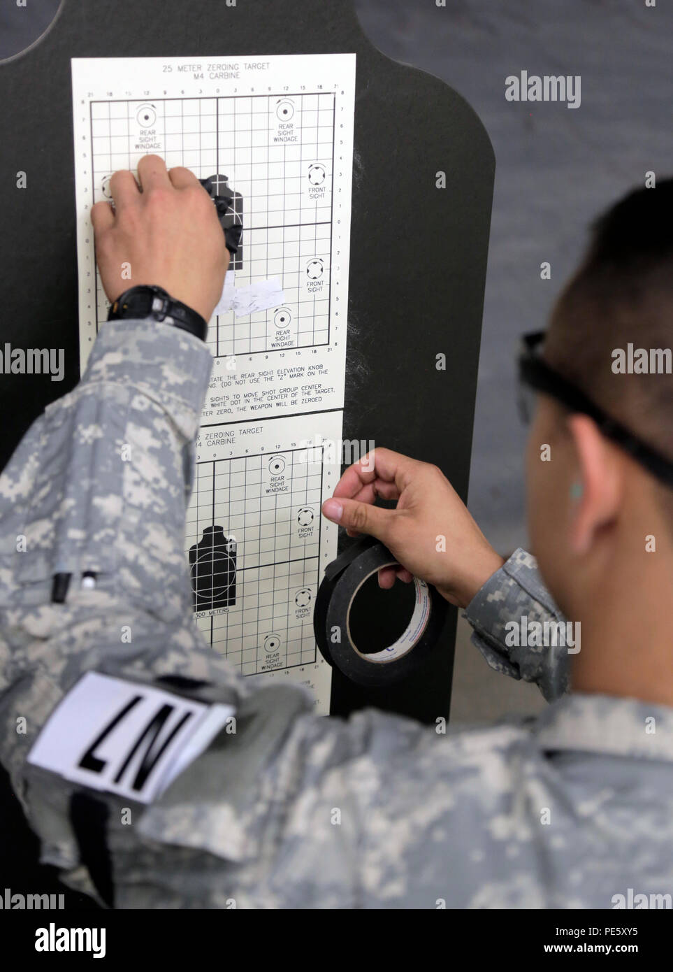 U.S. Army Sgt. Robert Cunningham, assigned to 119th Engineer Company ...