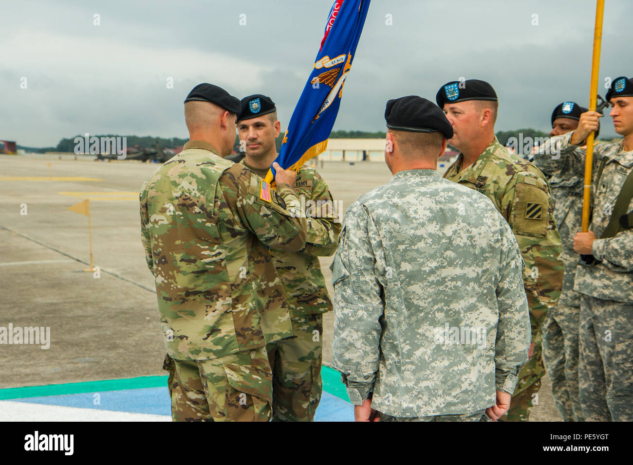 The 3rd Combat Aviation Brigade commander, Col. John D. Kline hands the ...