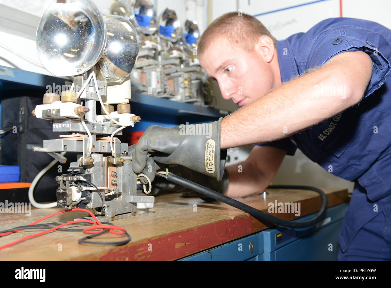 Petty Officer 2nd Class John Musiowski, an electrician's mate from Aids ...