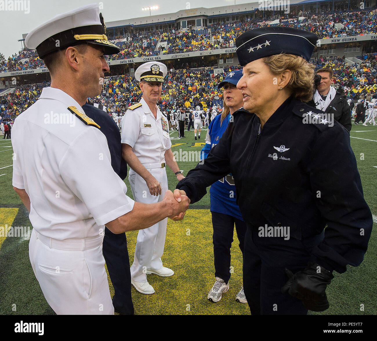Air Force Academy Commandant Lt. Gen. Michelle Johnson (right) gives a ...