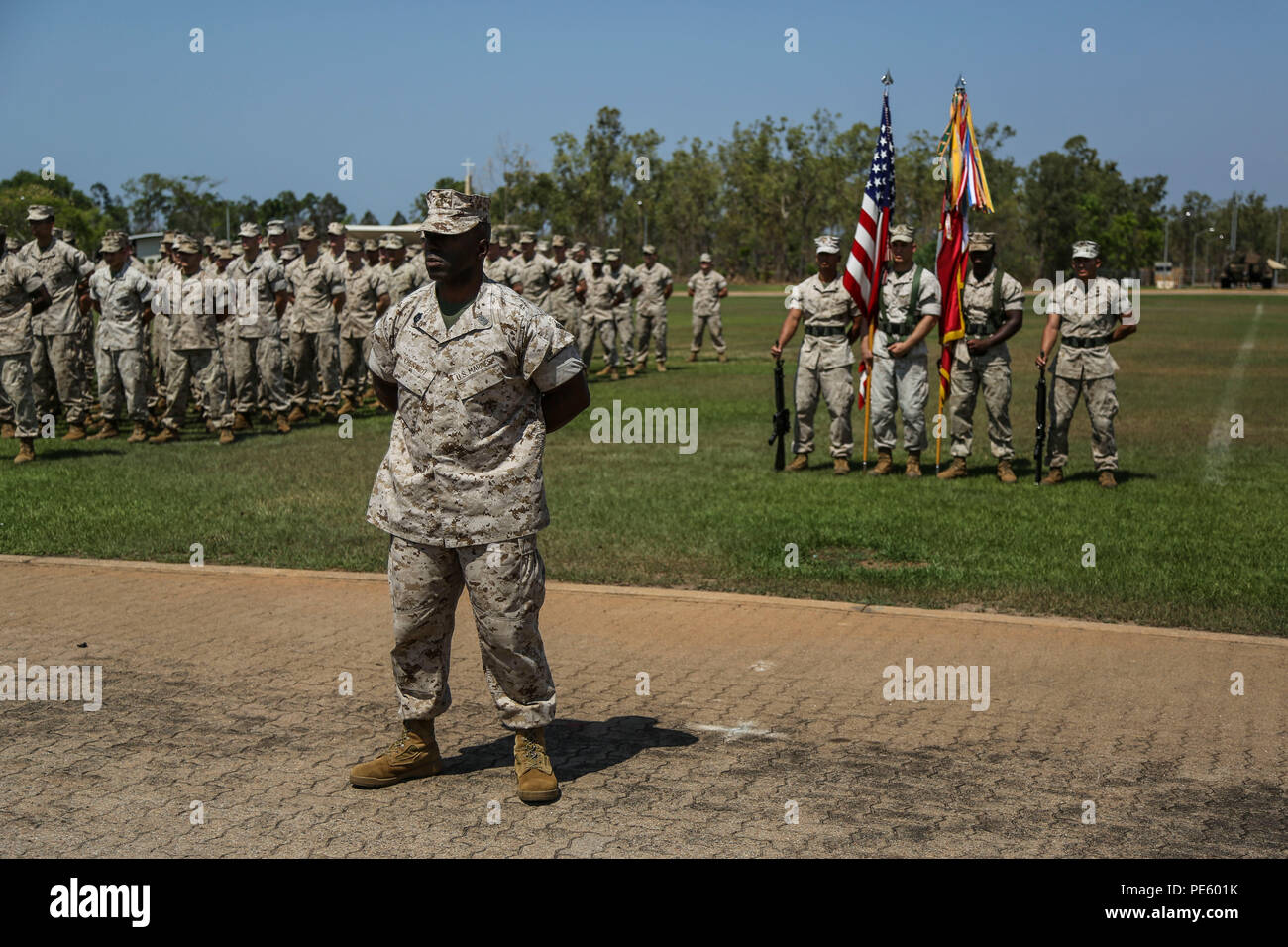 U.S. Marine Corps Sgt. Maj. Marcus Chestnut stands at parade rest with ...
