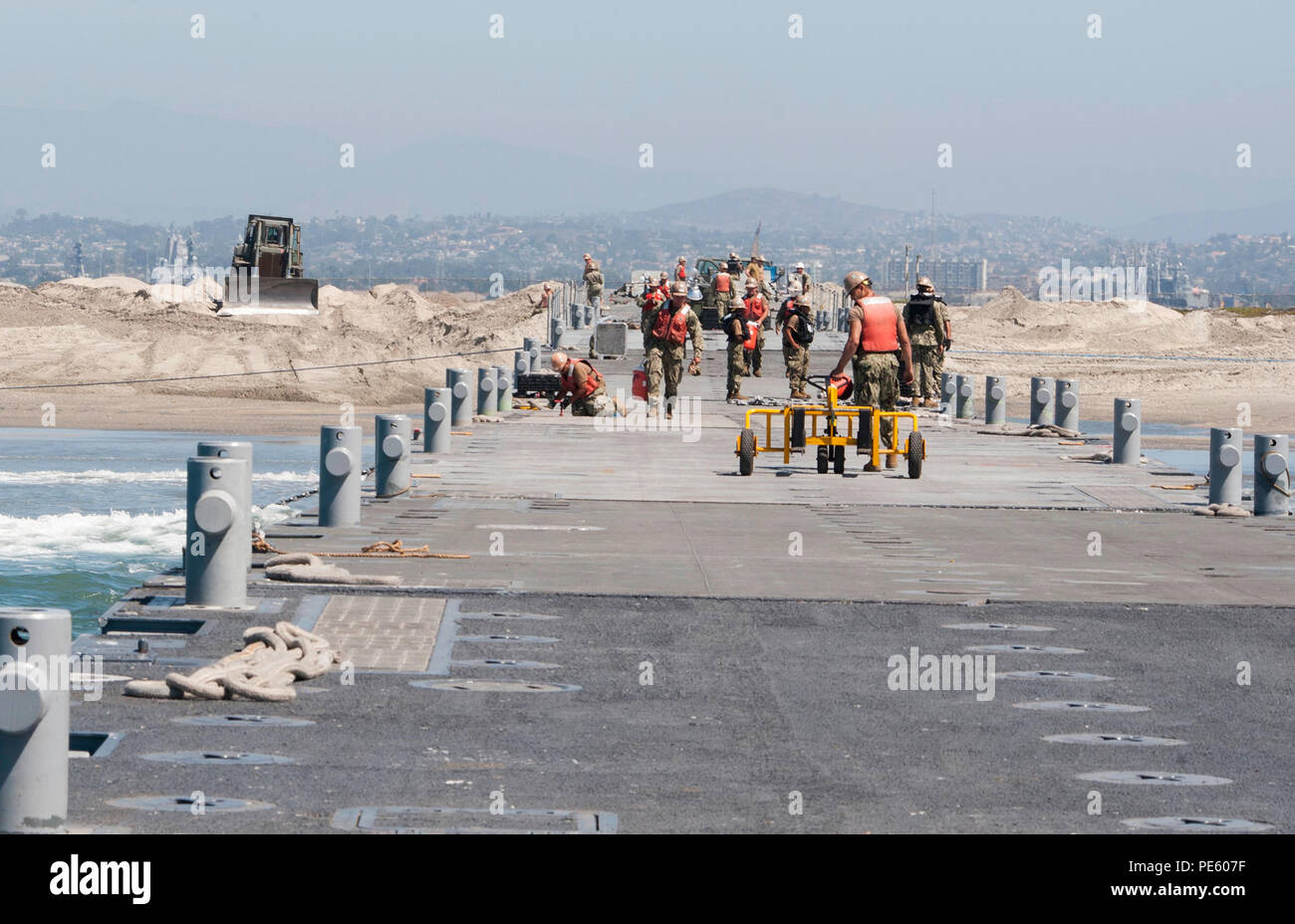 150926-N-KK081-1156 SAN DIEGO (Sept. 26, 2015) – Sailors, attached to ...