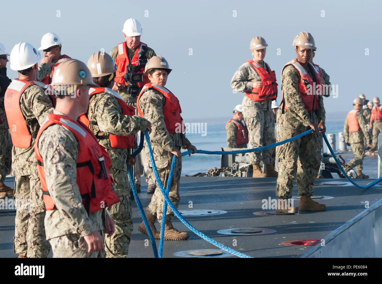 150926-N-KK081-285 SAN DIEGO (Sept. 26, 2015) – Sailors, attached to ...