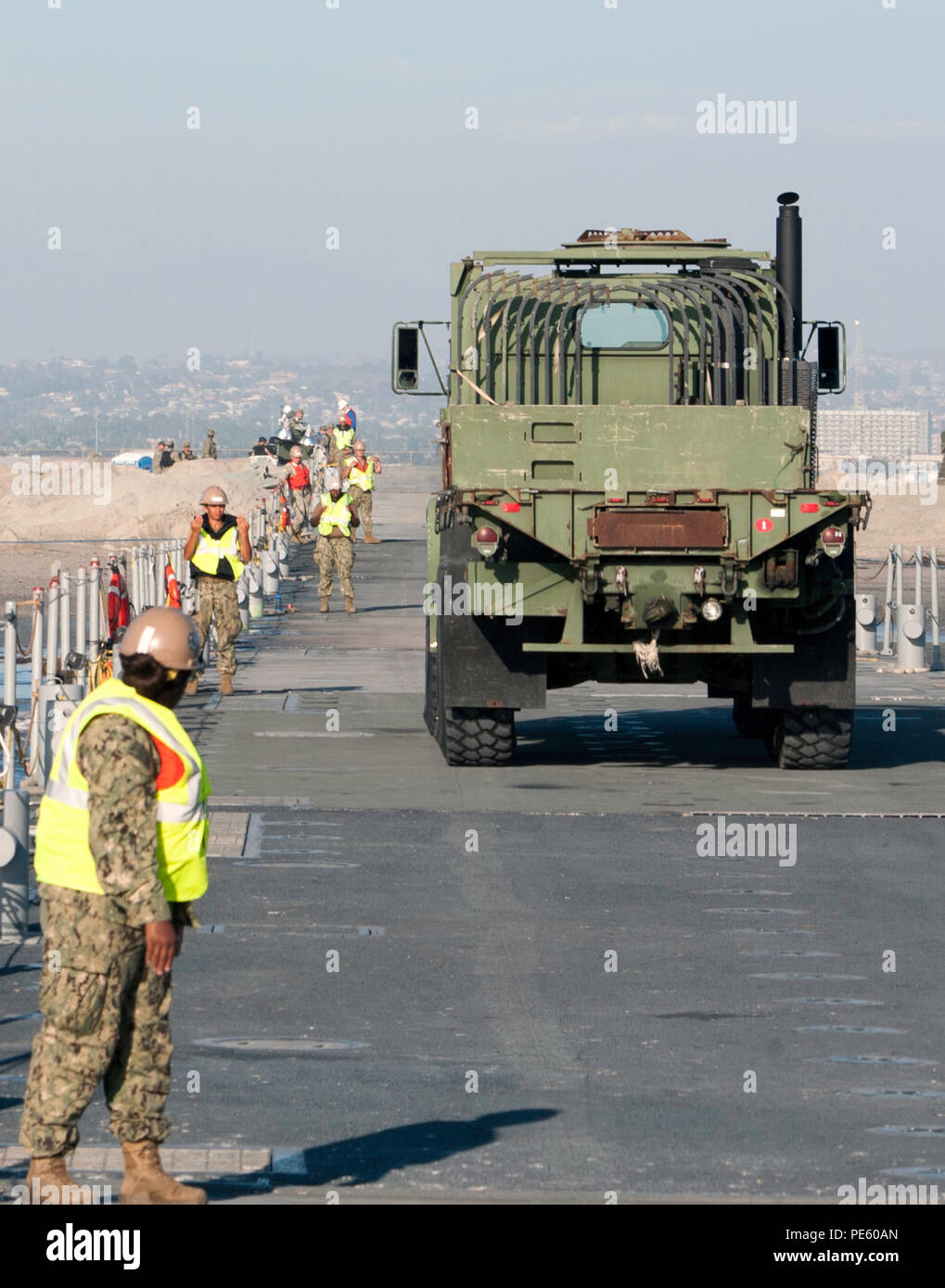 150927-N-KK081-290 SAN DIEGO (Sept. 27, 2015) – Sailors, attached to ...