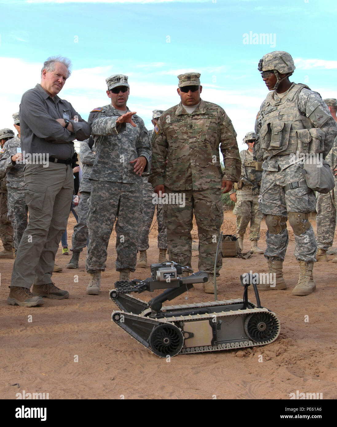 Capt. Thomas Brett (second from left), operations officer, 4th ...