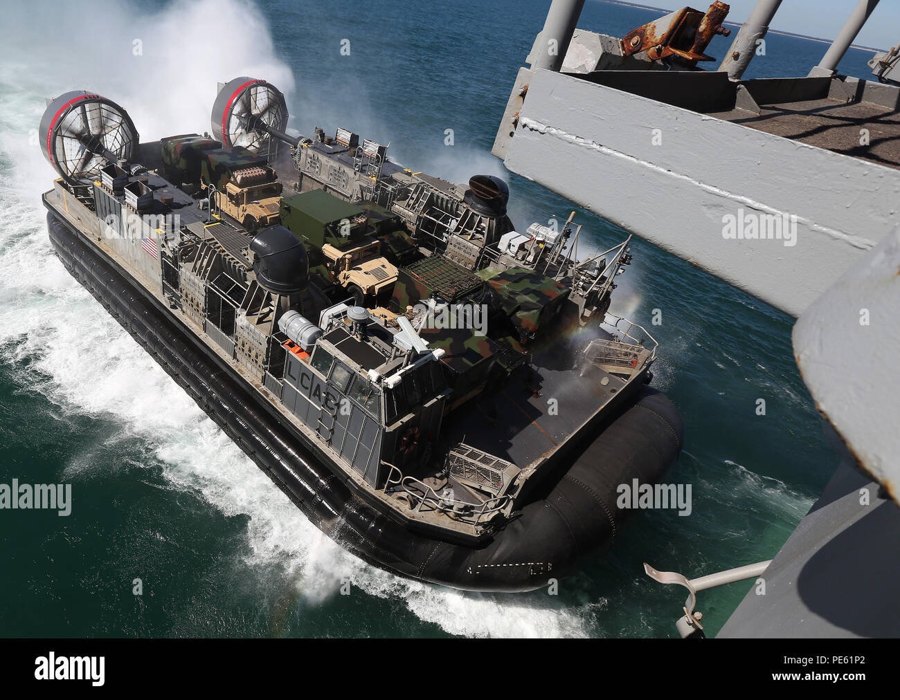 A U.S. Navy Landing Craft Air Cushion (LCAC) assigned to Amphibious ...