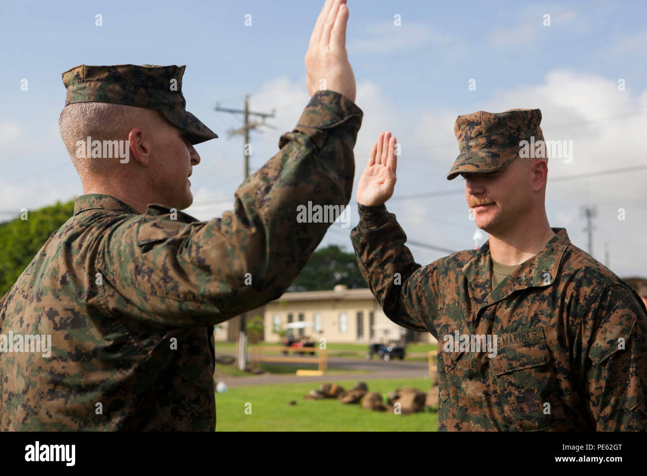 U.S. Marine Corps Lt. Col David T. Hudak, left, Commanding Officer, and ...
