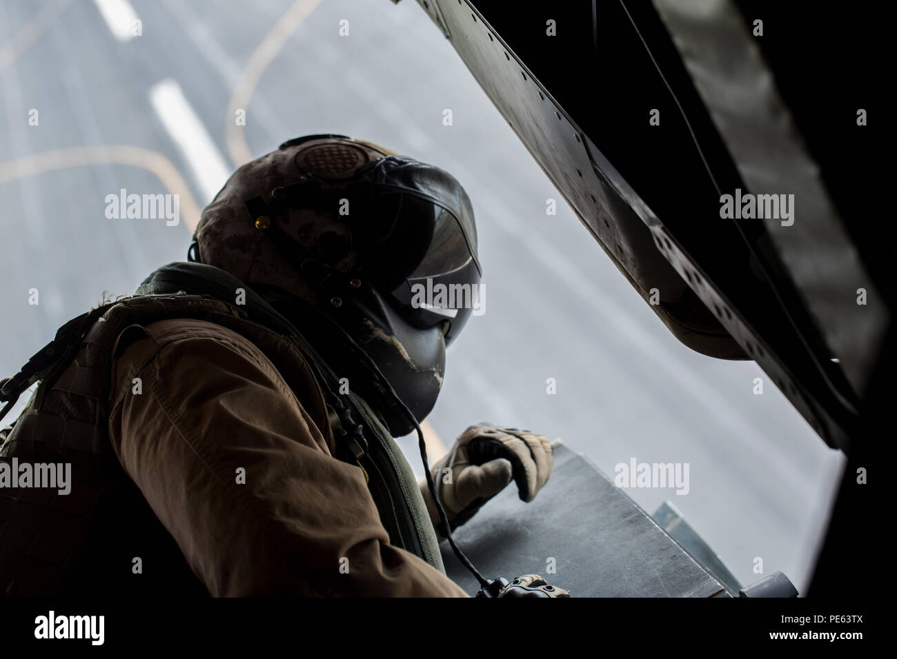 U.S. Marine Corps Gunnery Sgt. David T. Ferreira, a crew chief assigned ...