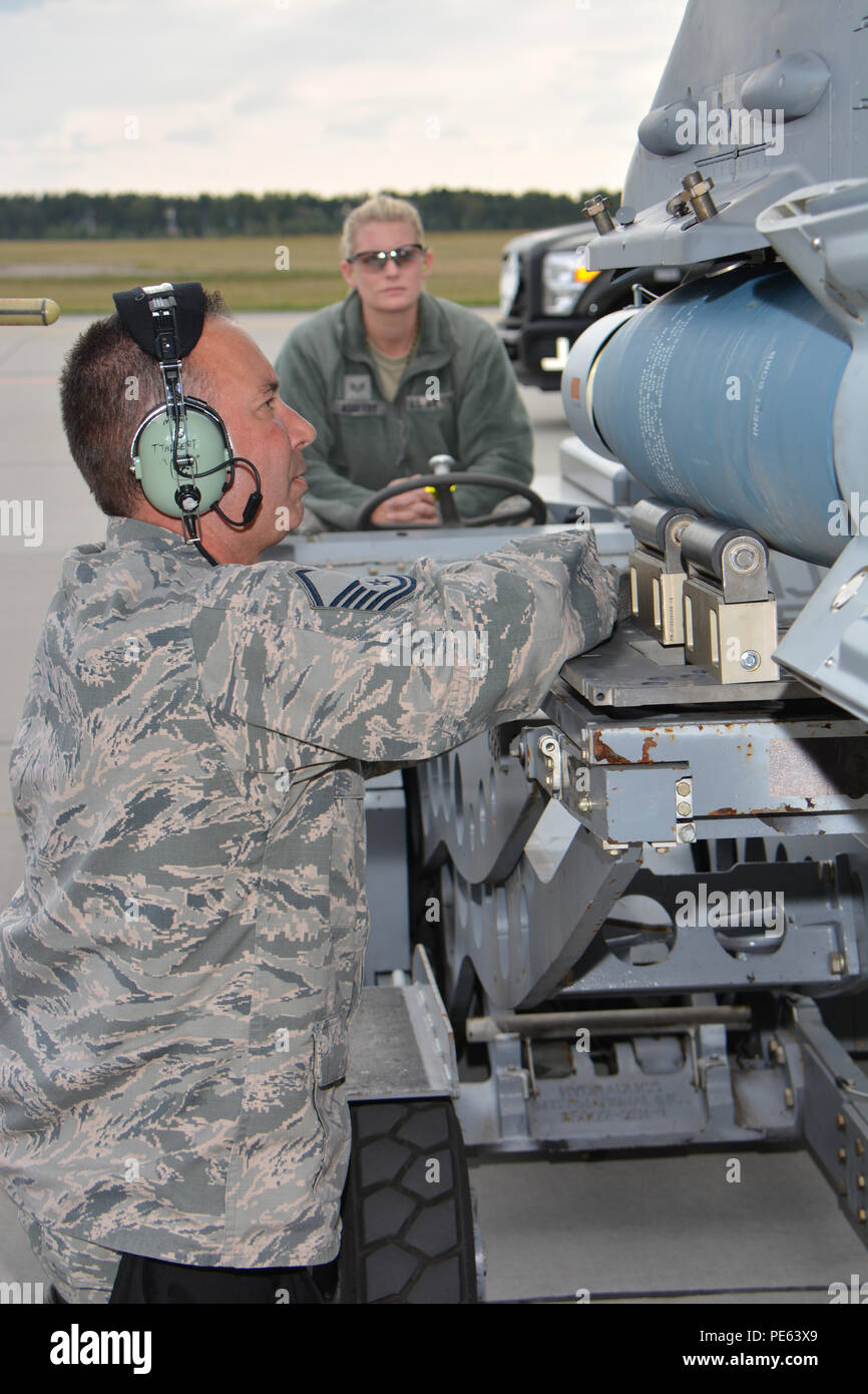 U.S. Air Force Master Sgt. Troy Tabbert, left, and U.S. Air Force Staff ...