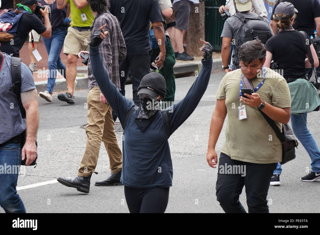 Washington, DC, USA. 12th Aug, 2018. An "antifa"" counter-protester ...