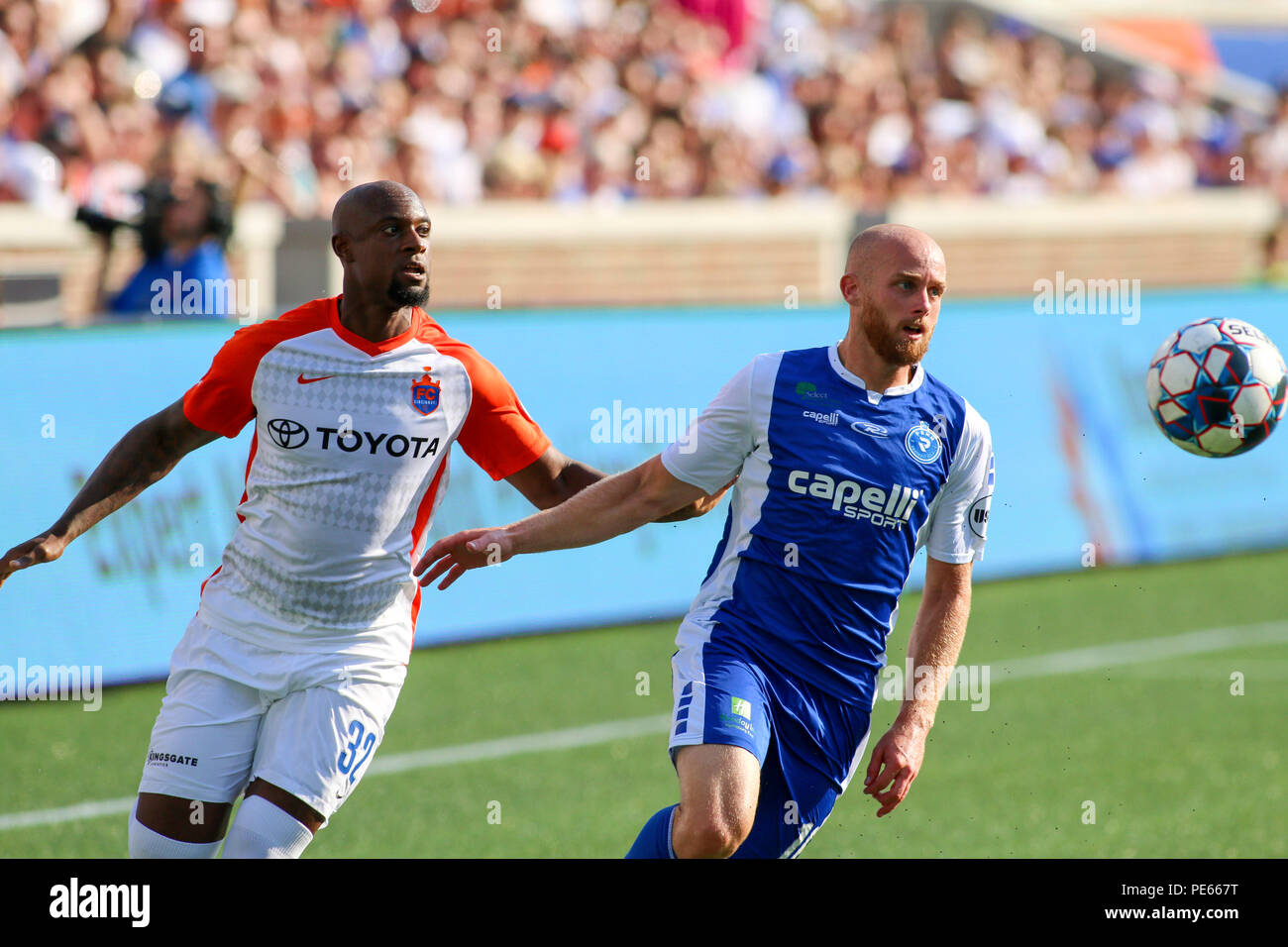 August 12, 2018: FC Cincinnati player Justin Hoyte (32) fights for the ...