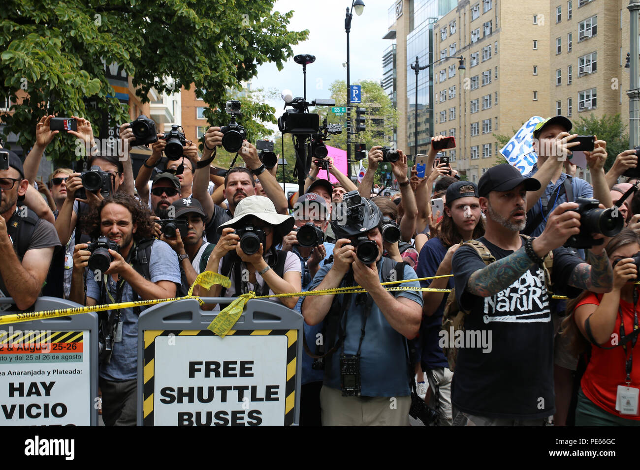Washington, DC, USA. 12 Aug 2018. Photographers and counterprotestors ...