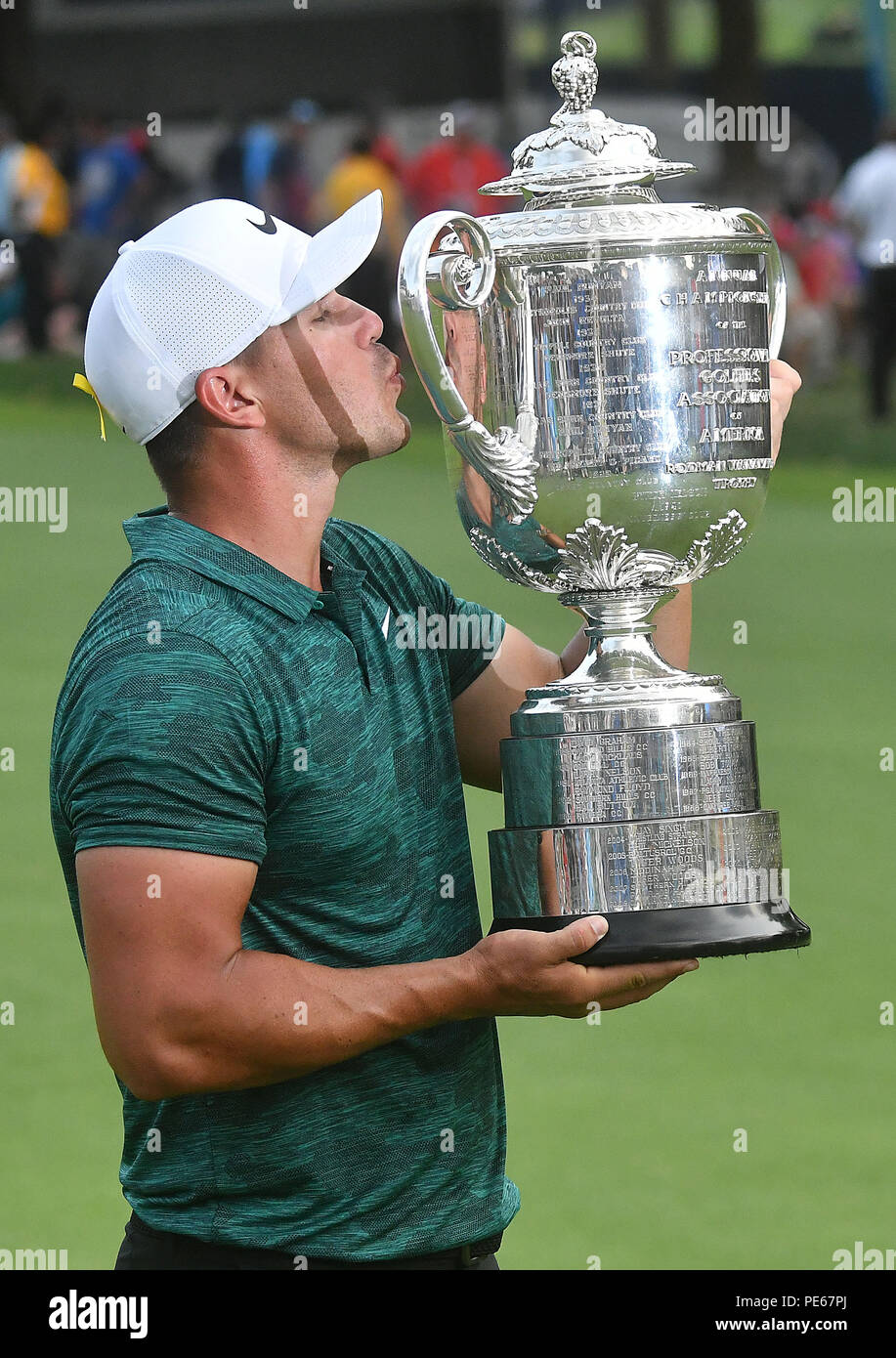 St Louis, MO, USA. 12th Aug, 2018. Brooks Koepka kisses the Wanamaker ...