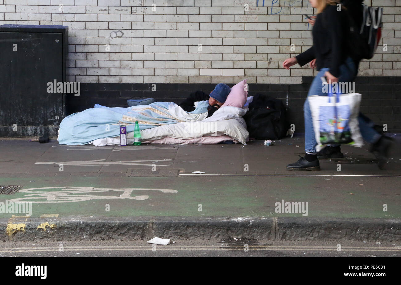 Homeless people sleeping under bridge hi-res stock photography and ...