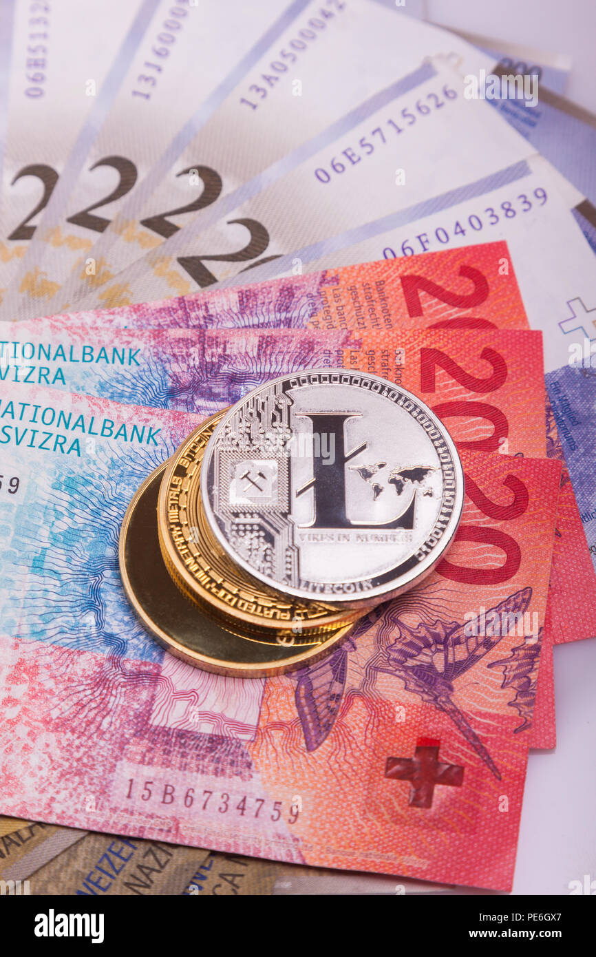 Bitcoin btc crypto currency coin over swiss francs bank notes Stock ...