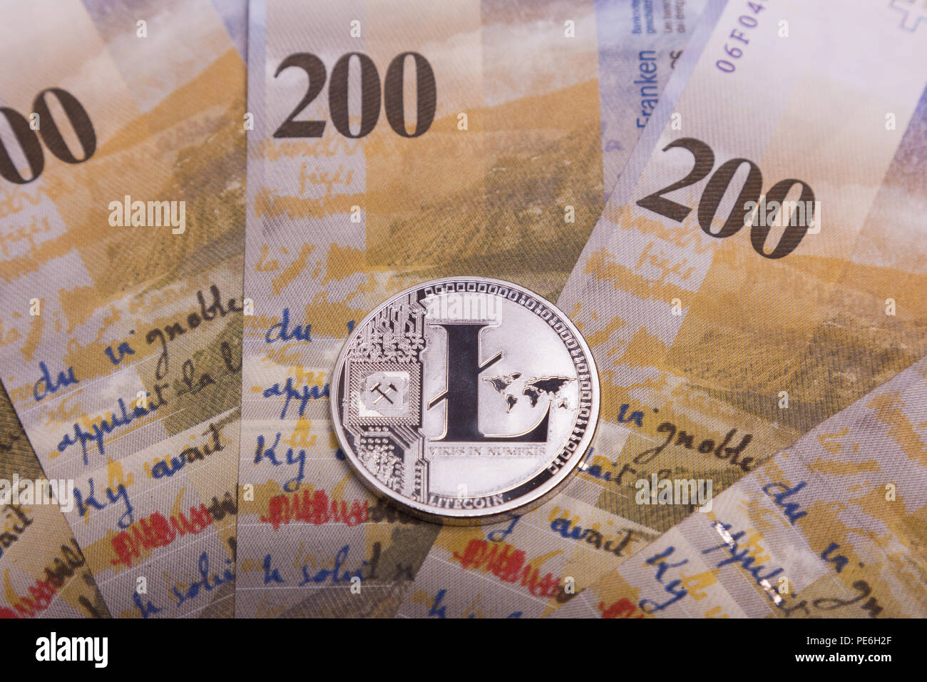 Bitcoin btc crypto currency coin over swiss francs bank notes Stock ...