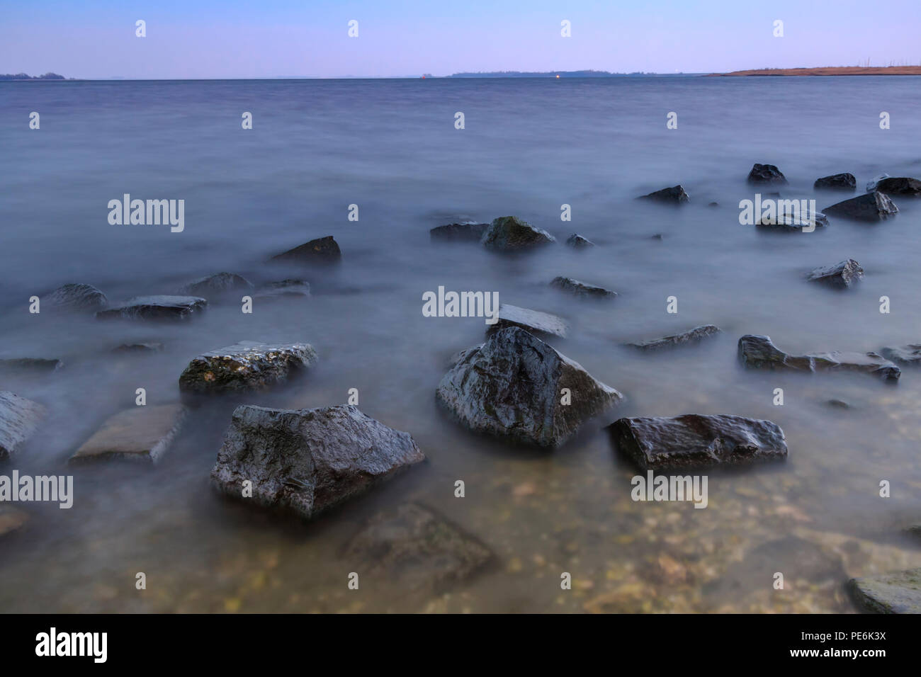 Rocks on the zeeland coast of the netherlands hi-res stock photography ...