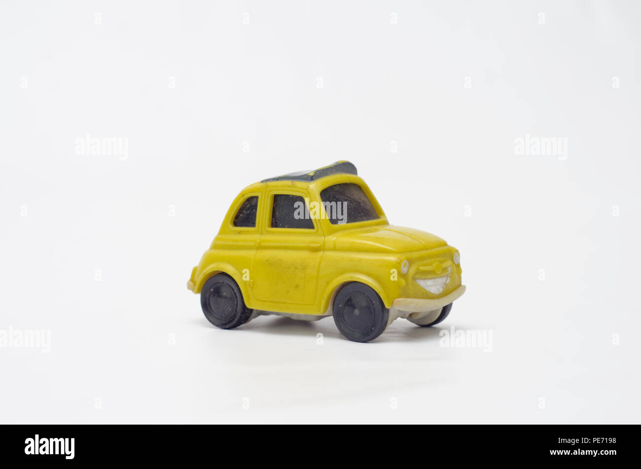 Yellow plastic cart Stock Photo - Alamy