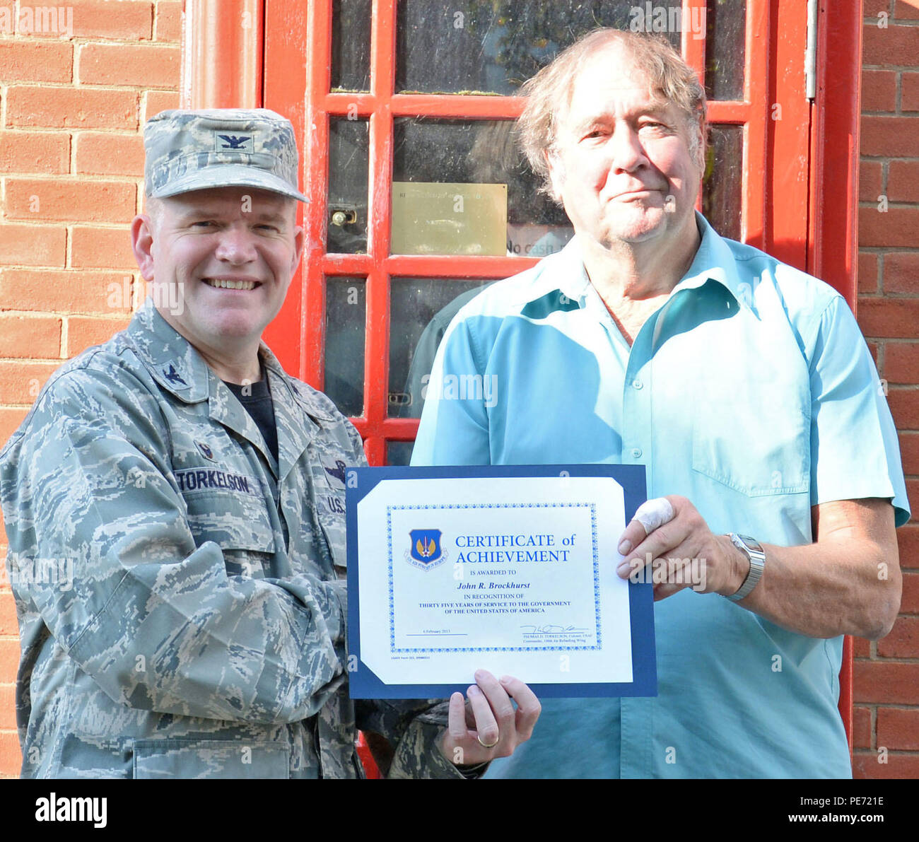 U.S. Air Force Col. Thomas D. Torkelson, left, 100th Air Refueling Wing ...