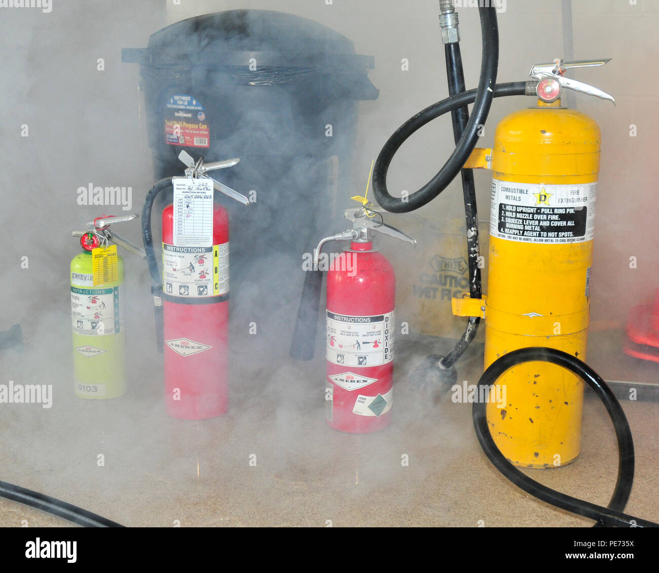 Halon, A, B, C and D class fire extinguishers being displayed at the ...