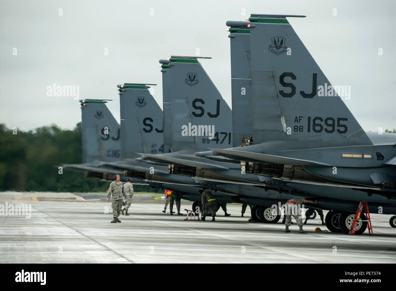 Four F-15E Strike Eagles from the 335th Fighter Squadron receive final ...