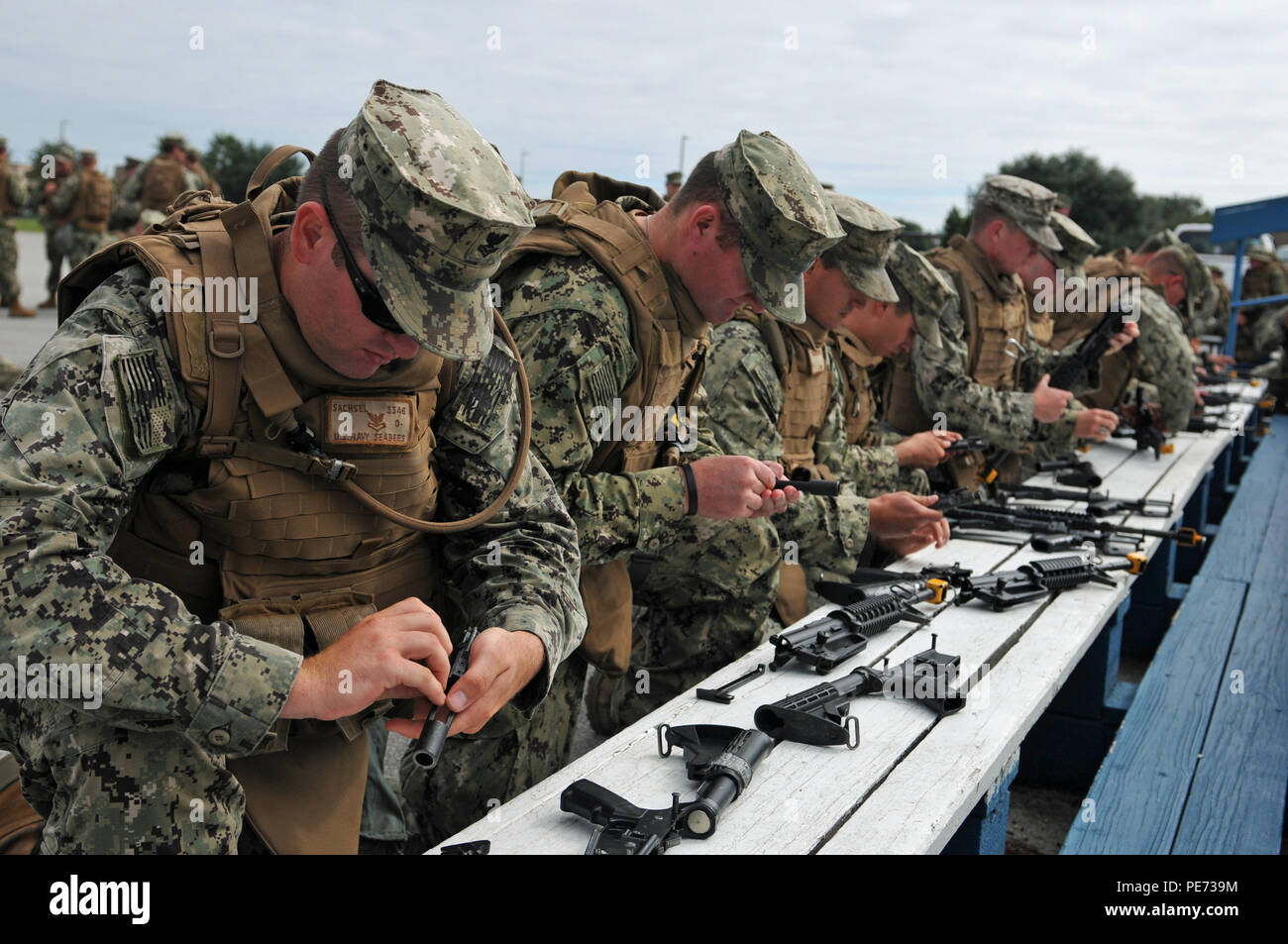 Naval Mobile Construction Battalion 133 Seabees begin to disassemble ...