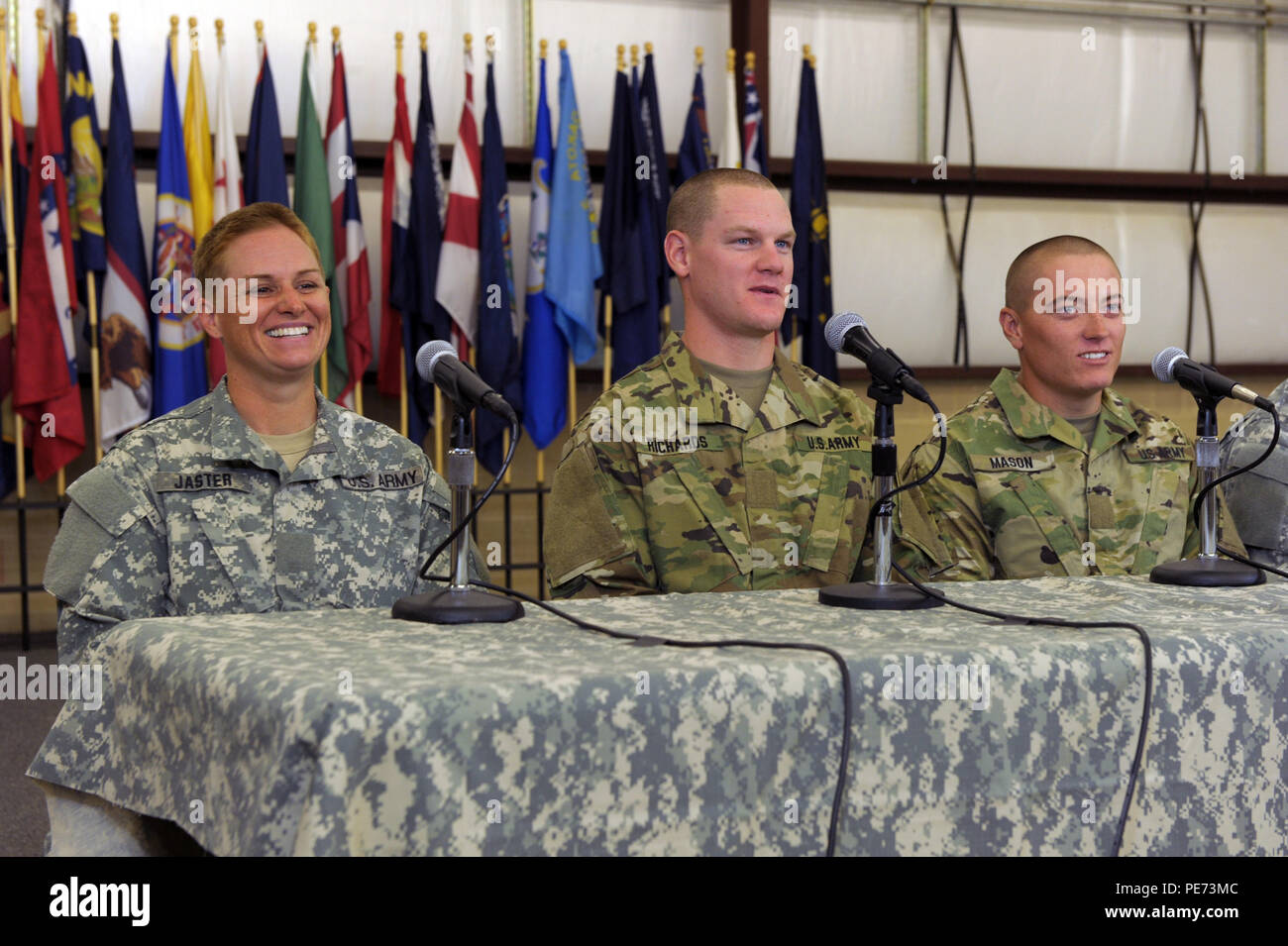 U.S. Army Maj. Lisa Jaster, left, along with fellow Ranger School ...