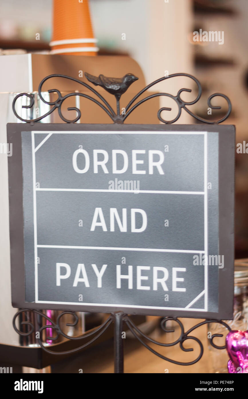 Order and pay here sign, stock photo Stock Photo - Alamy