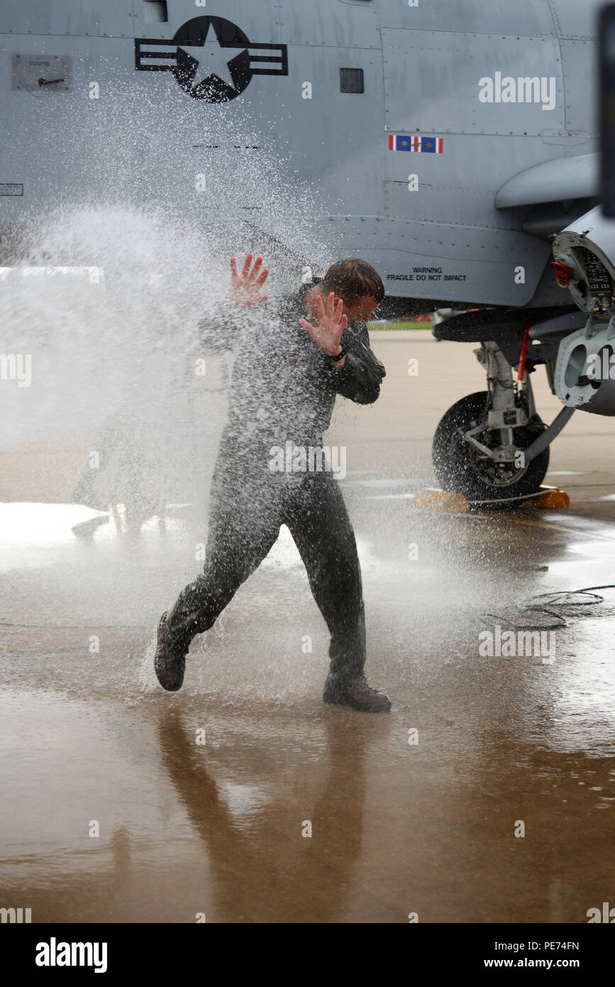 Brig. Gen. Scott Kelly, 175th Wing commander, gets showered with water ...