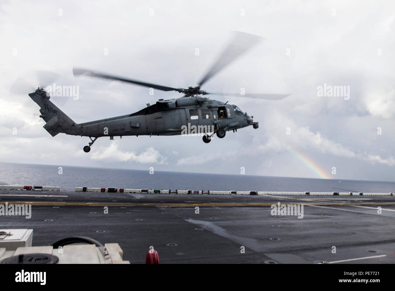 A U.S. Navy SH-60 Seahawk assigned to Amphibious Squadron (PHIBRON) 4 ...