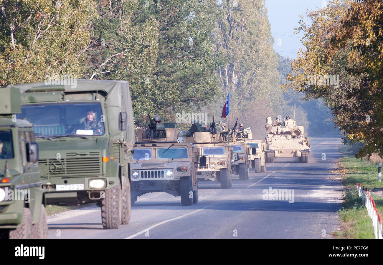 Soldiers from 25th Infantry Brigade, Hungarian Defense Forces followed ...