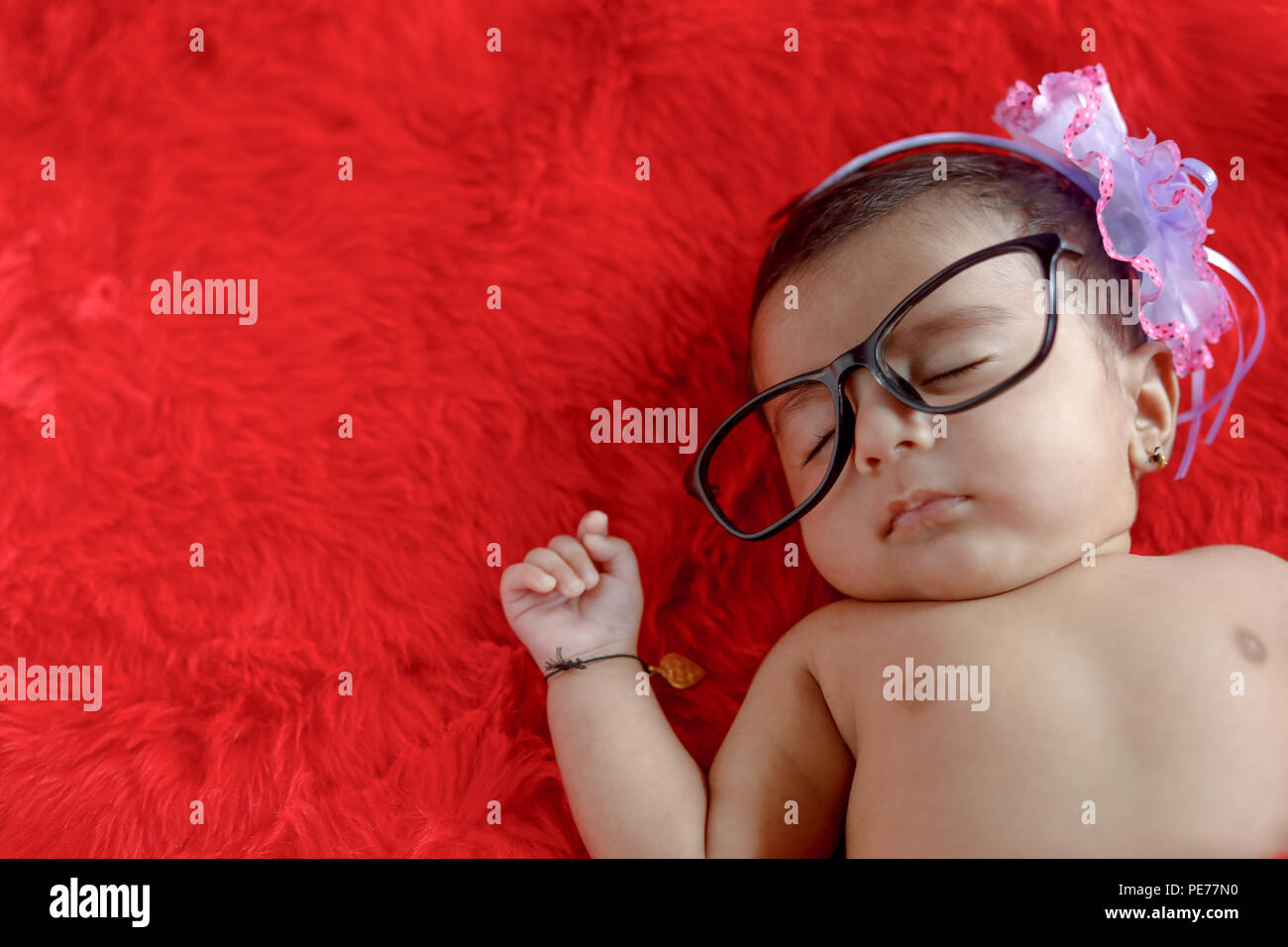 cute Indian baby girl on spectacles Stock Photo - Alamy