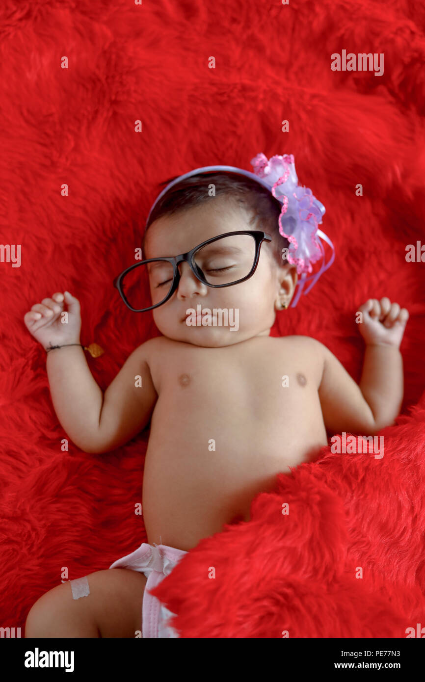 cute Indian baby girl on spectacles Stock Photo - Alamy