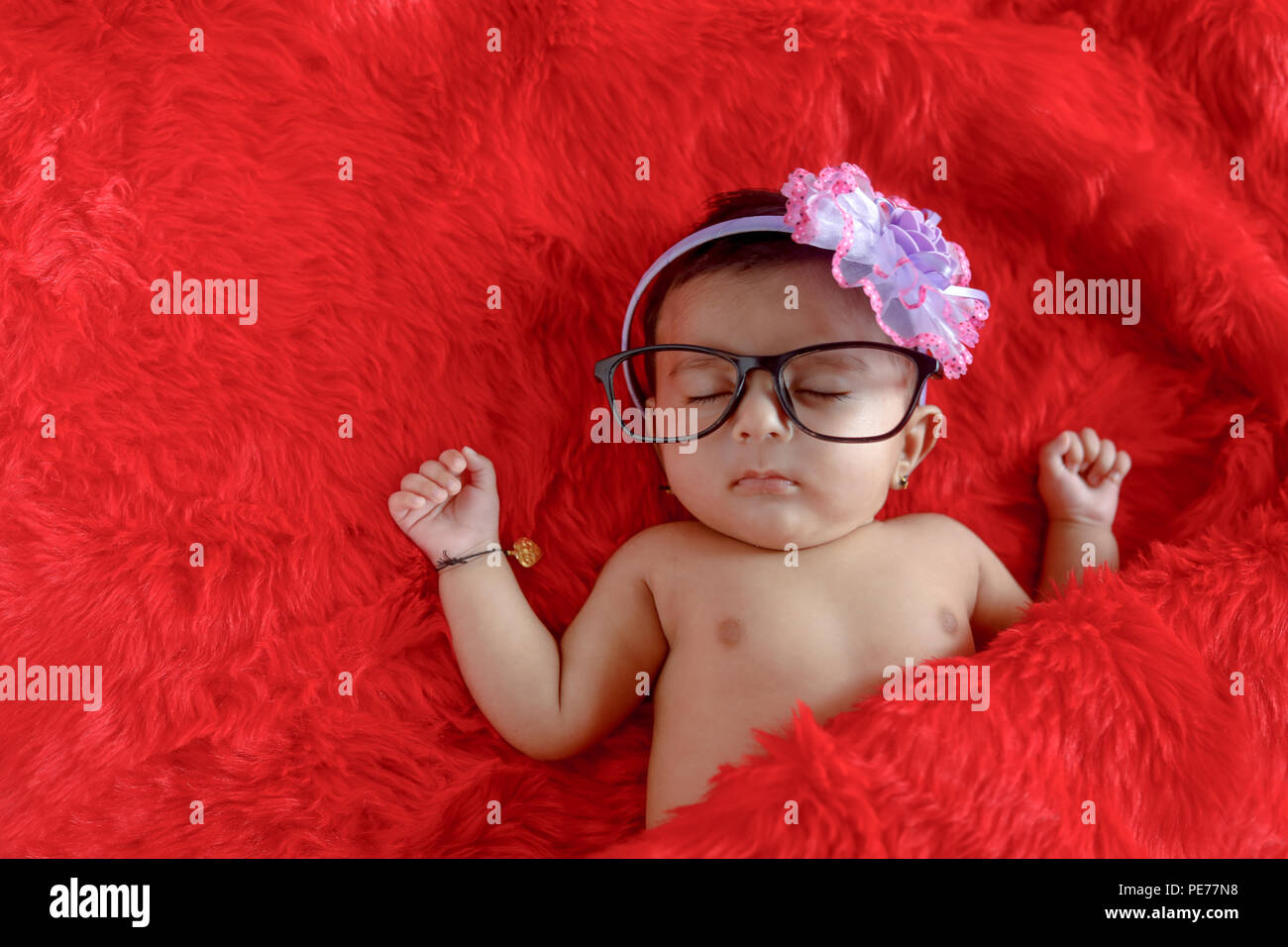 cute Indian baby girl on spectacles Stock Photo - Alamy