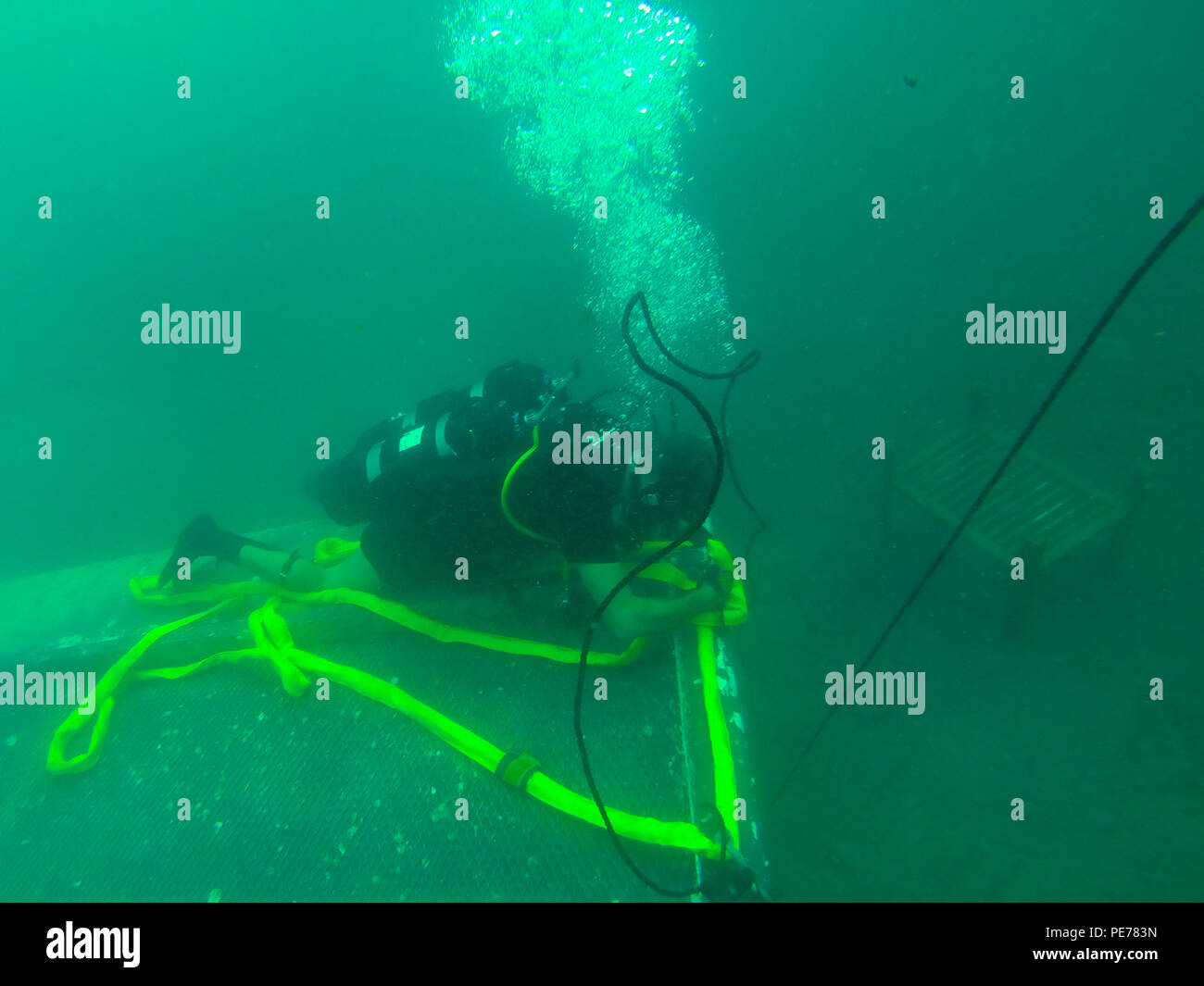 Spc. Trevin Currey, a diver with the 74th Engineer Diver Detachment ...