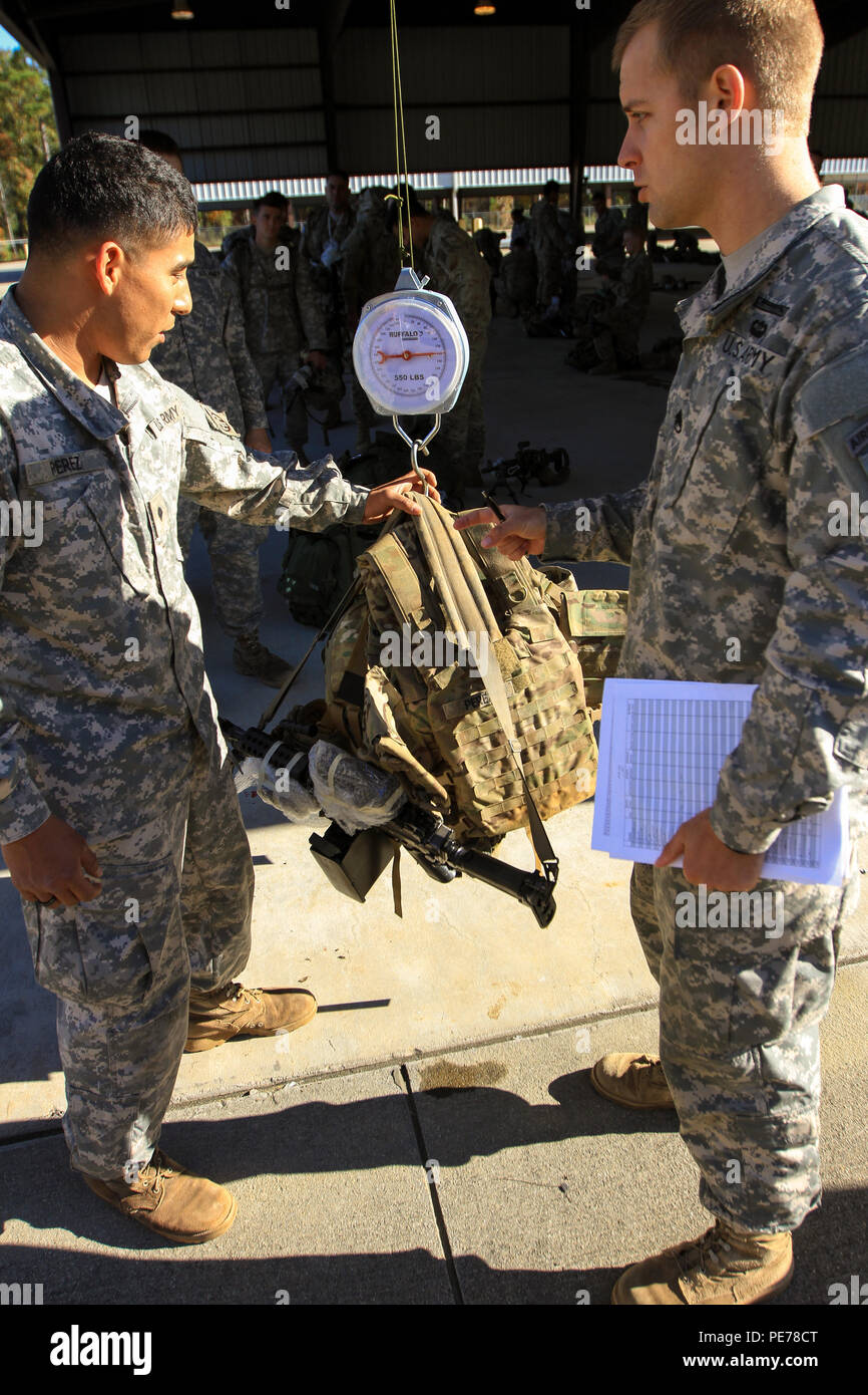 Staff Sgt. George Applegate, right, an infantryman assigned to the 2nd ...