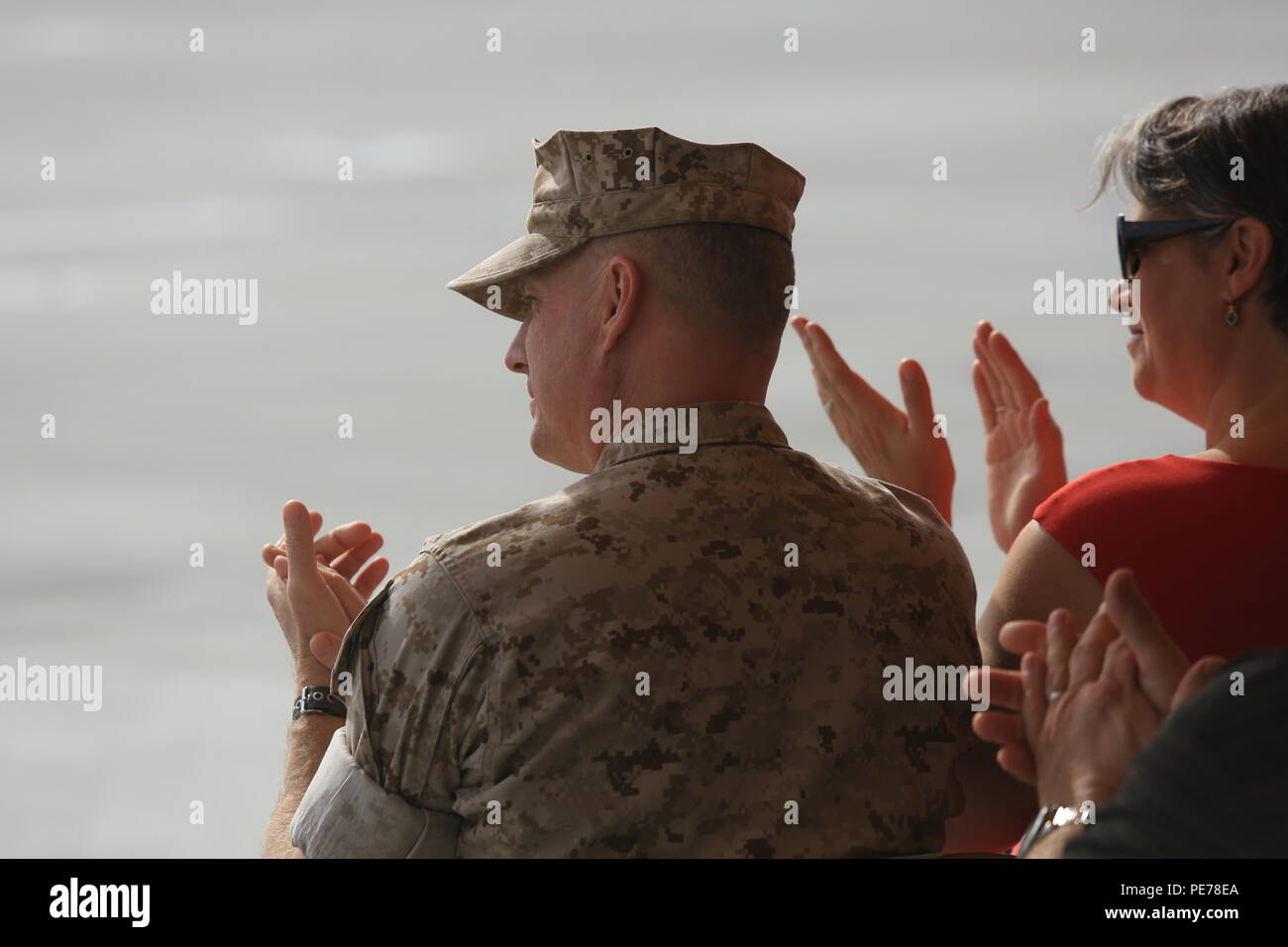 U.S. Marine Corps Lt. Col. Michael J. Harmon, left, the commanding ...