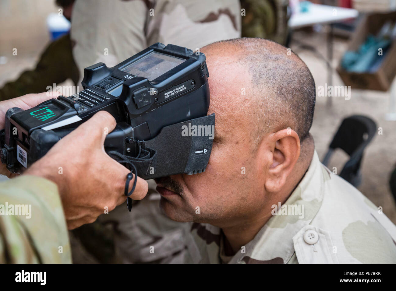 An Iraqi soldier assigned to the 71st Iraqi Army Brigade is entered ...