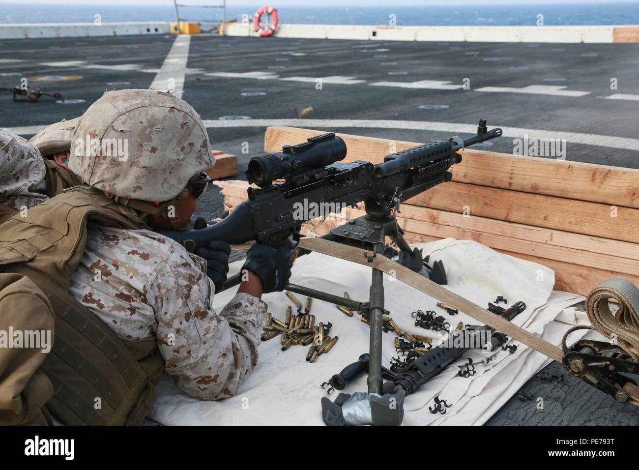 GULF OF ADEN (Oct. 29, 2015) U.S. Marine Cpl. LaNita Moss fires an ...